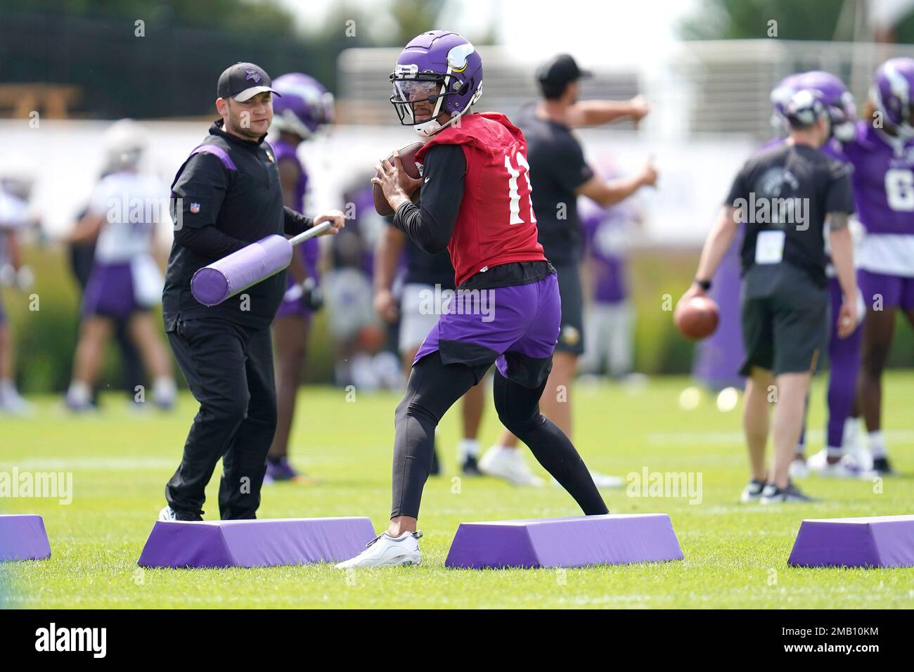 Minnesota Vikings quarterback Kellen Mond (11) takes part in drills ...