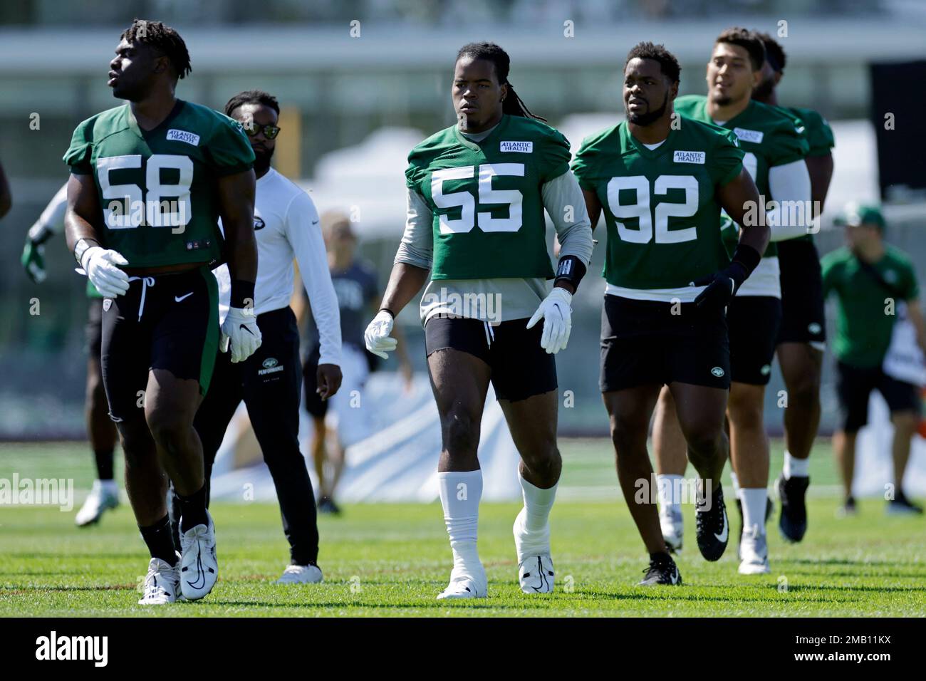 New York Jets defensive lineman Hamilcar Rashed (55) takes part in ...