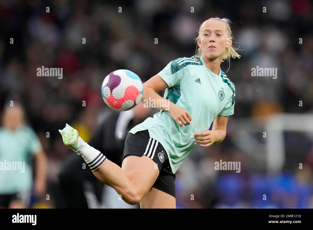 Germany's Lea Schueller plays with a ball during warmup before the ...