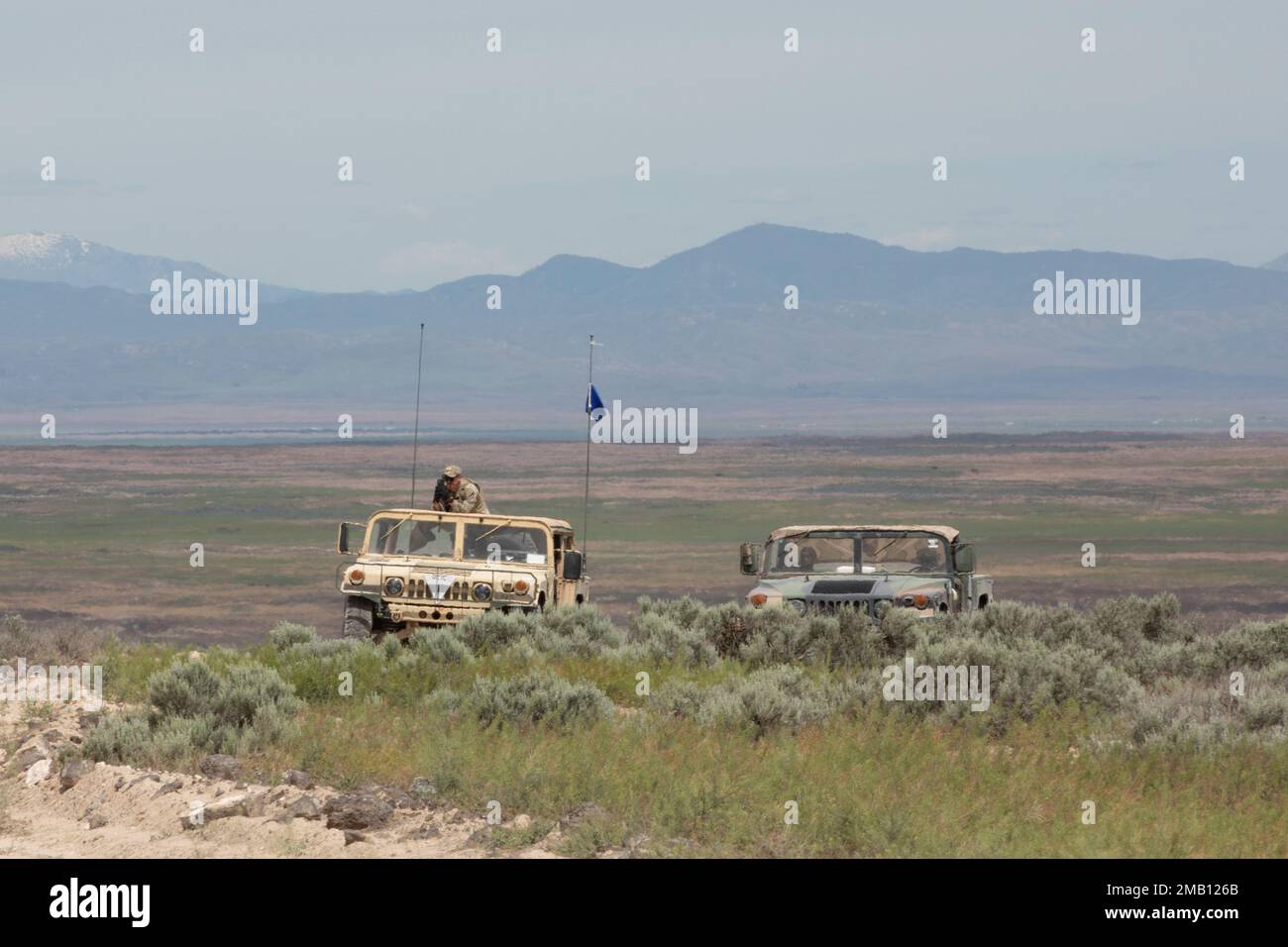 An observer controller/trainer, and opposing forces roleplayers watch ...