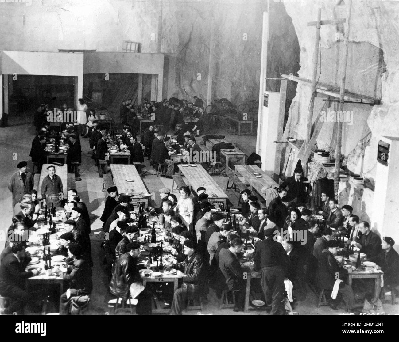 In this handout from the U.S. Army Air Force, workmen eat in the big ...