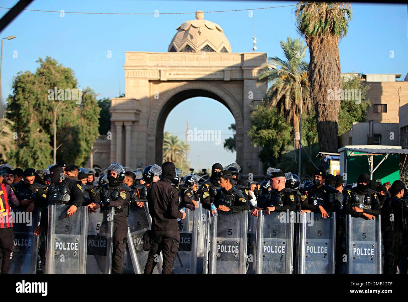 Iraqi security forces stand guard outside the heavily fortified Green ...