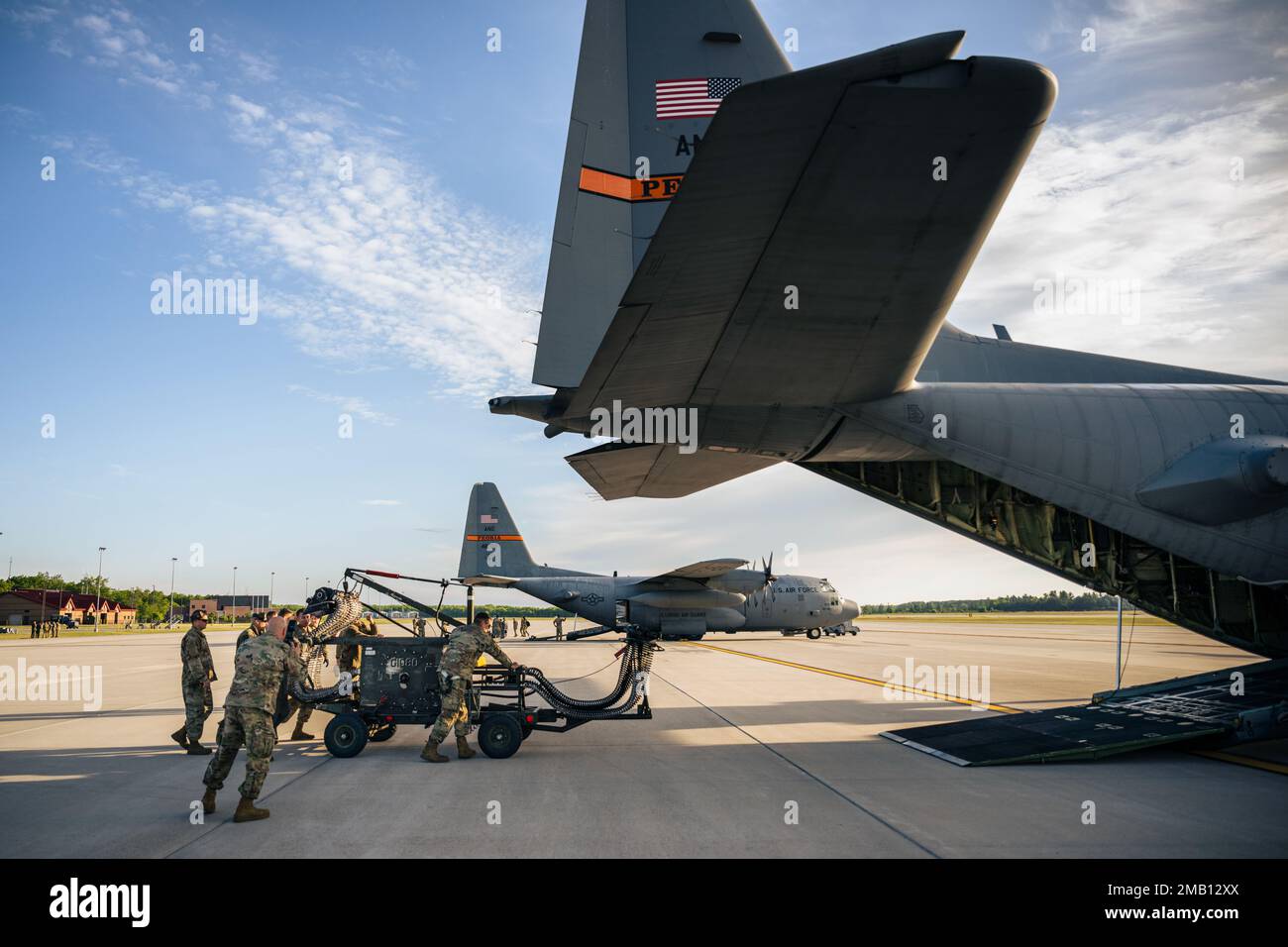 U.S. Air Force Staff Sgt. Cy Snyder III and Senior Airman Naden ...