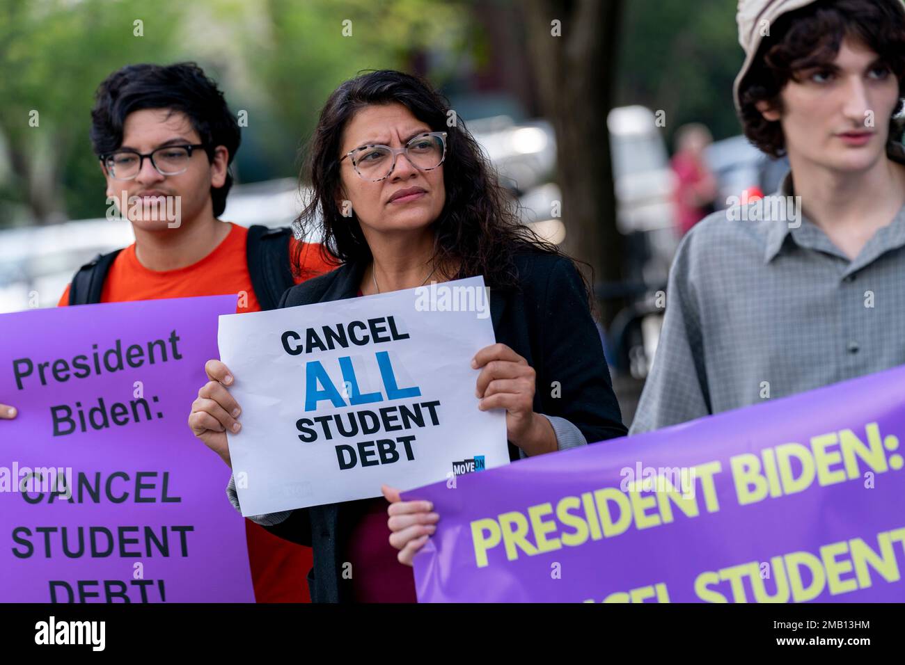 Rep. Rashida Tlaib, D-Mich., center, and her son Adam, left, attend a ...