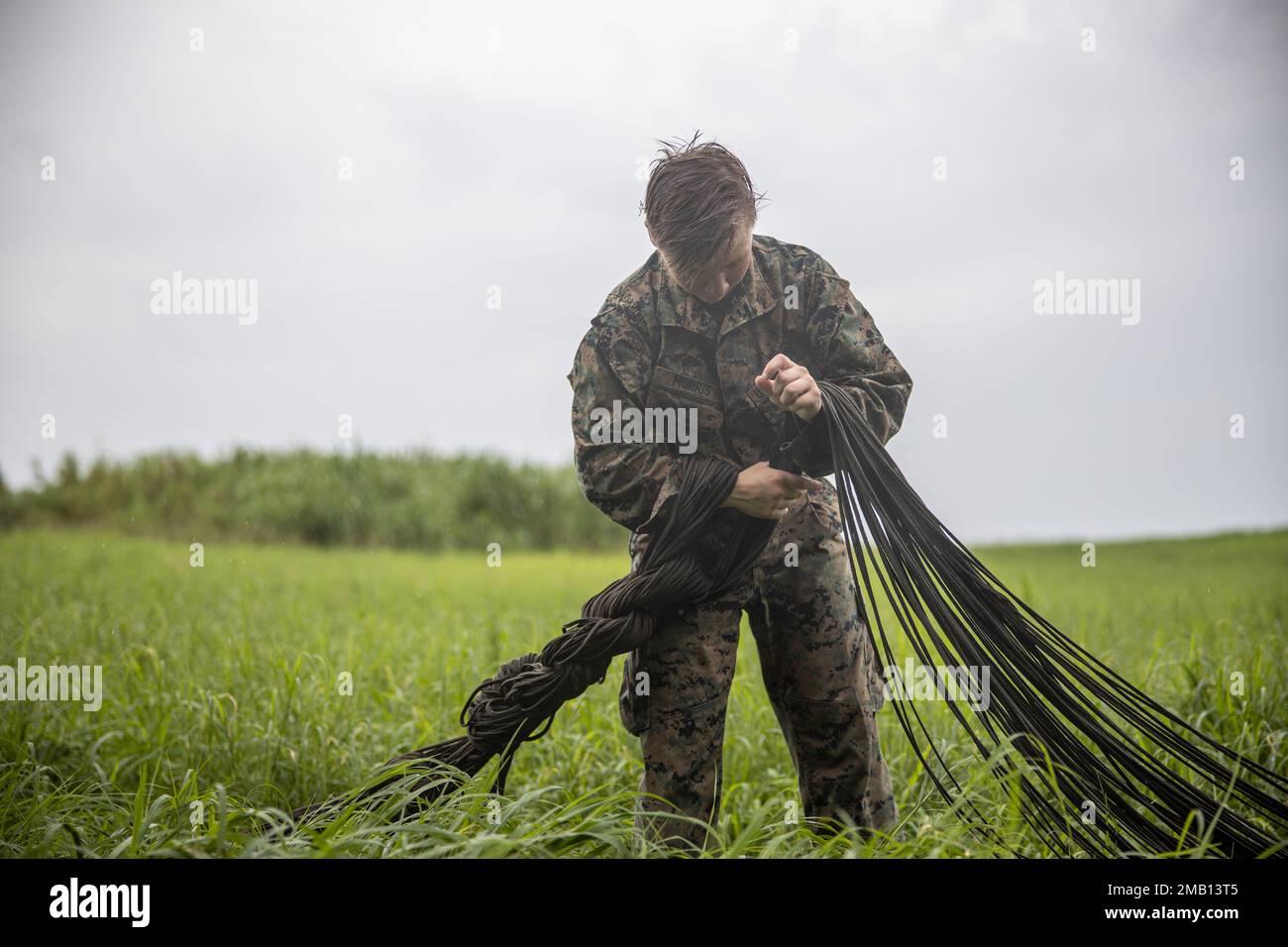 U.S. Marine Corps Lance Cpl. Bailey Morris, a parachute rigger with 3rd ...