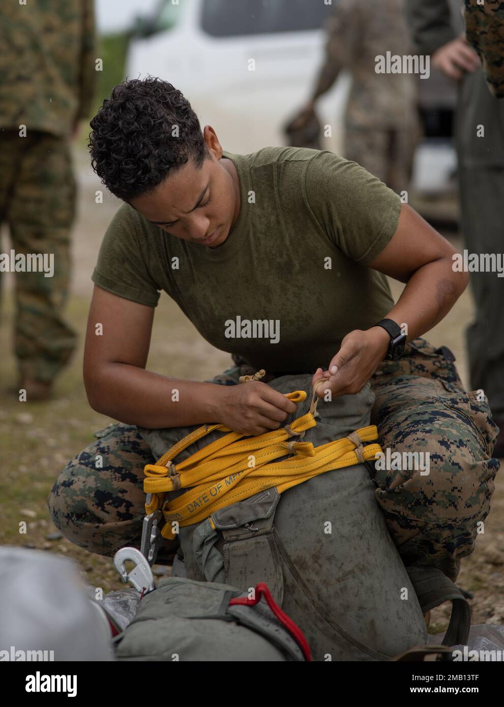 U.S. Marine Corps Lance Cpl. Chandra Crane, a parachute rigger with 3rd ...