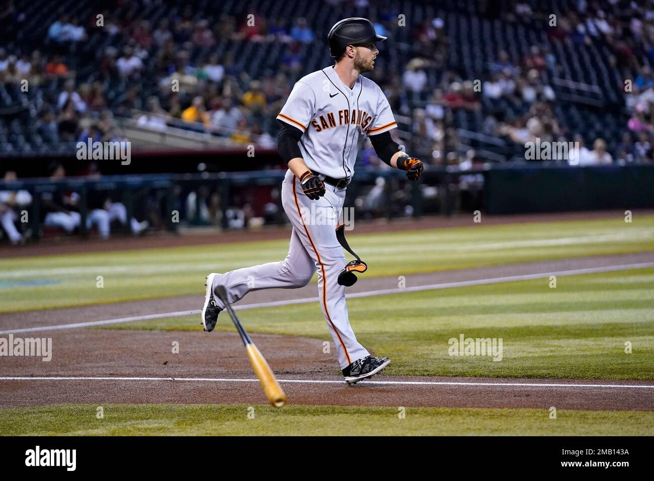 San Francisco Giants' Austin Slater tosses his bat and elbow guard away ...