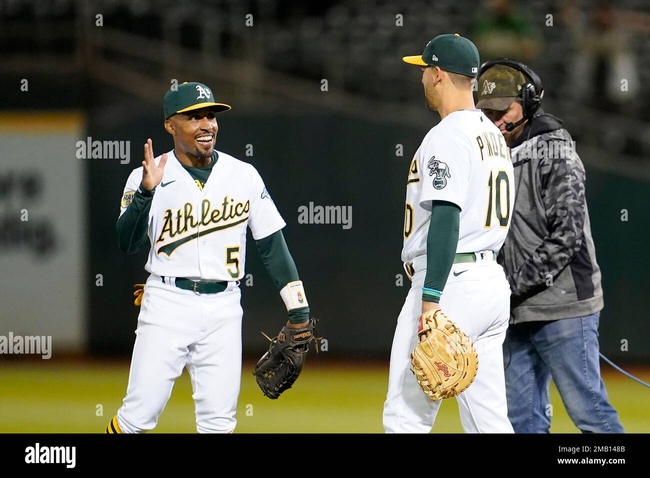 Oakland Athletics' Tony Kemp, left, celebrates with Chad Pinder after ...