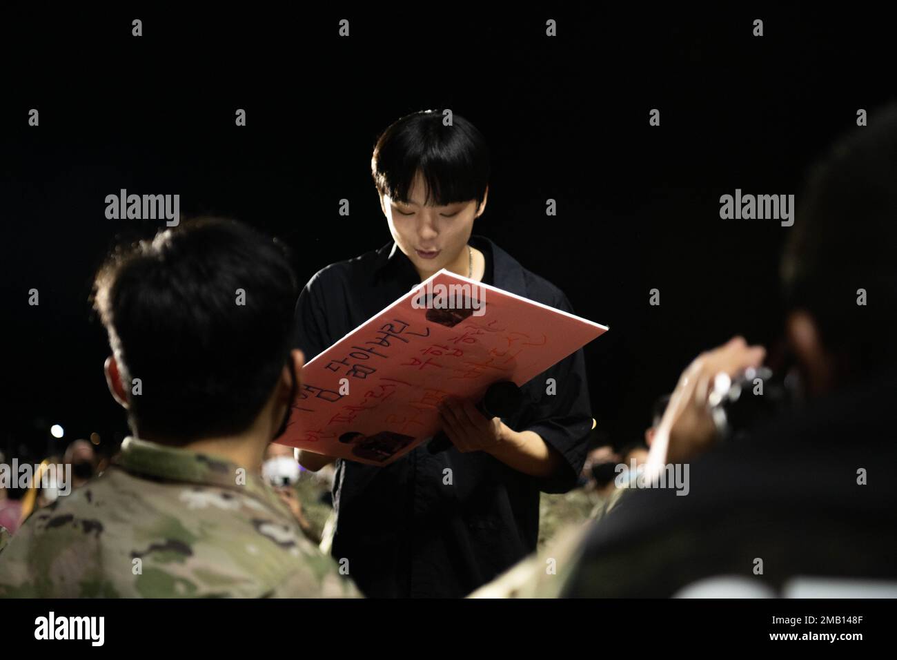 Layone signs autographs for fans at a K-Pop concert held on Balboni ...