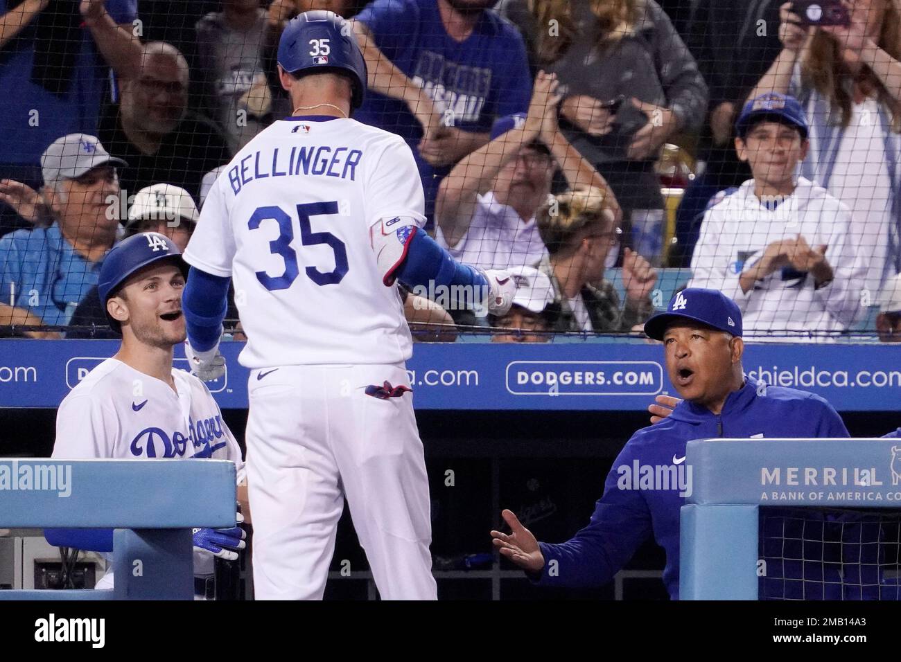 Los Angeles Dodgers' Cody Bellinger, center, is congratulated by Trea ...