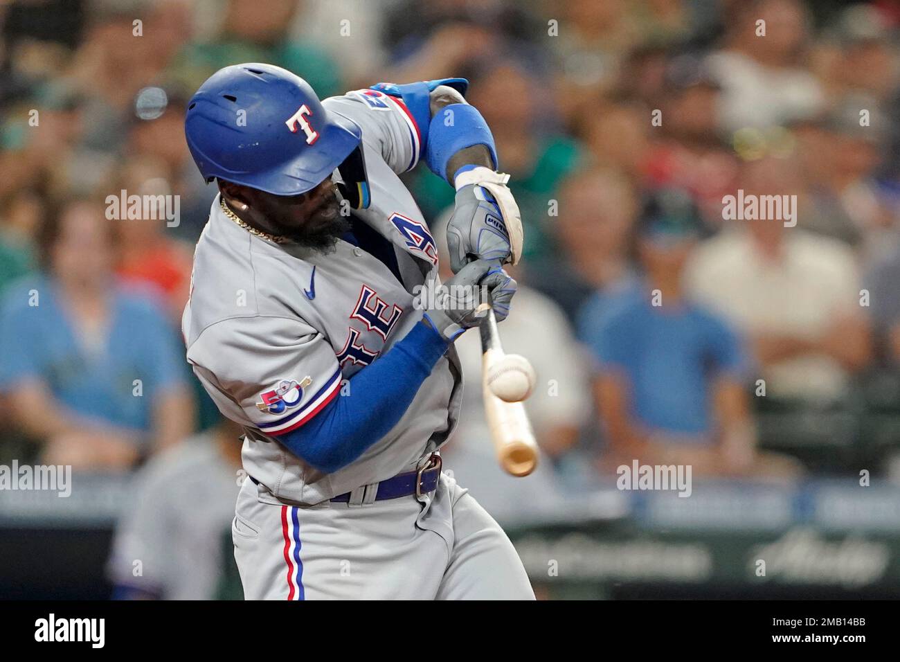 Texas Rangers' Adolis Garcia hits a two-run double during the eighth ...