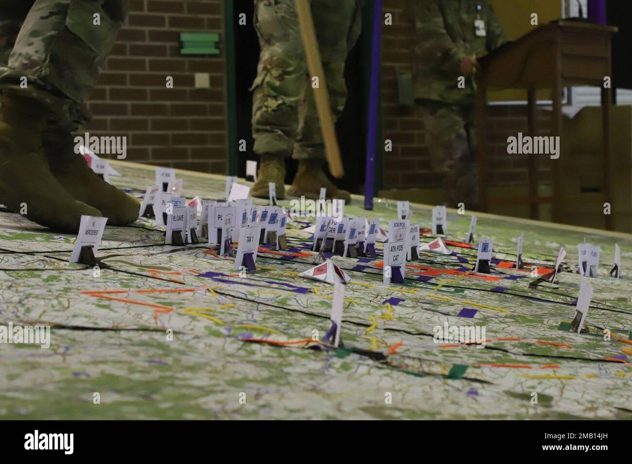 V Corps Soldier moves icons on the planning map during the combined ...