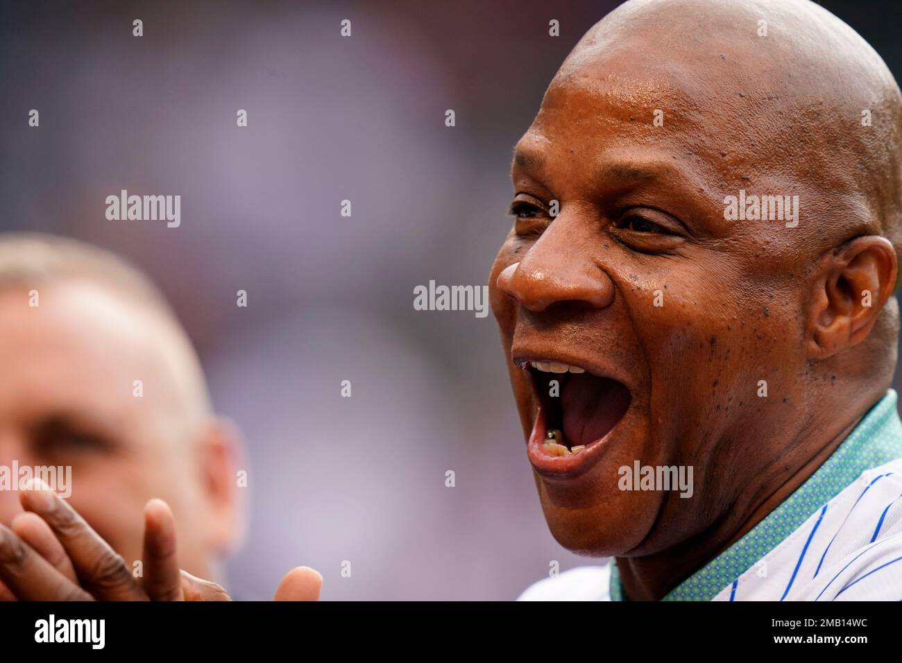 Former New York Mets player Darryl Strawberry talks to fans before a ...