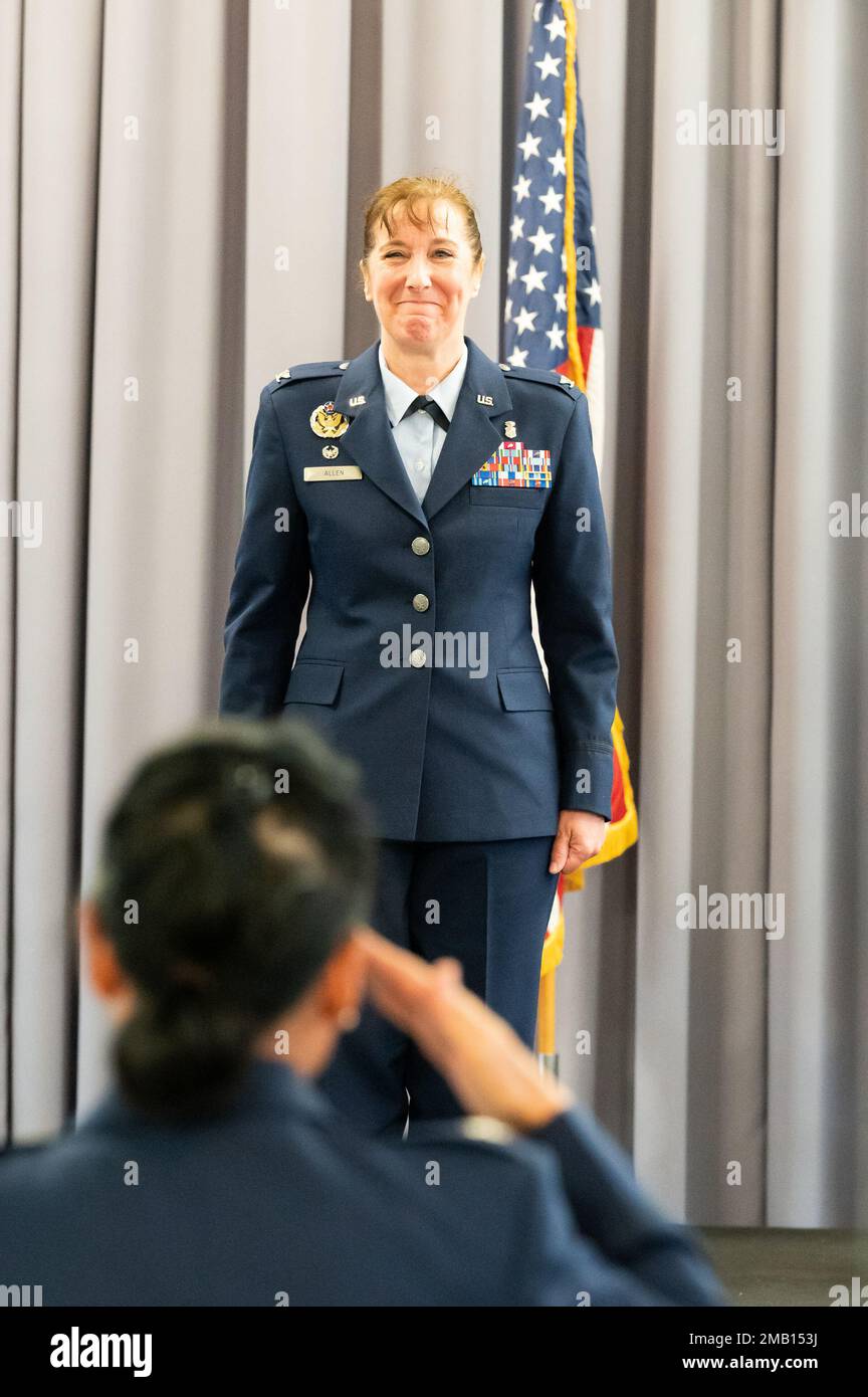 Col. Tracy Allen, outgoing 436th Medical Group commander, receives a ...