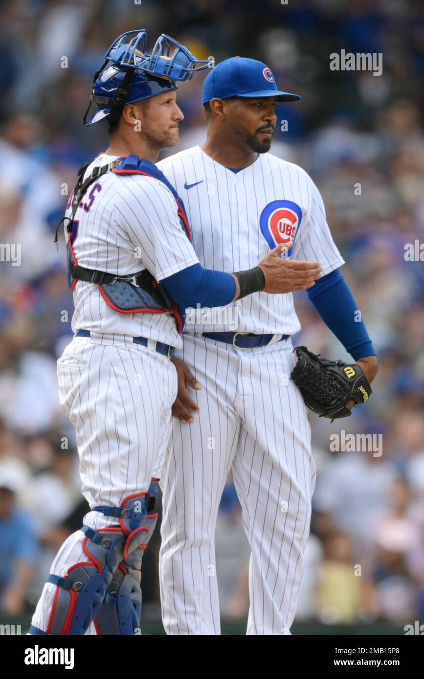 Chicago Cubs closing pitcher Mychal Givens, right, celebrates with ...