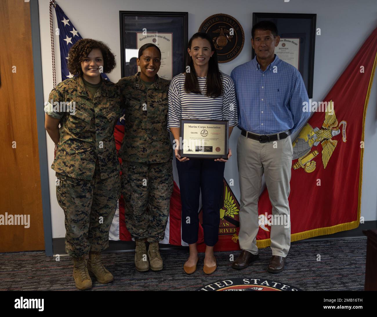 Mrs. Megan Perkins, center right, an administrative assistant with ...
