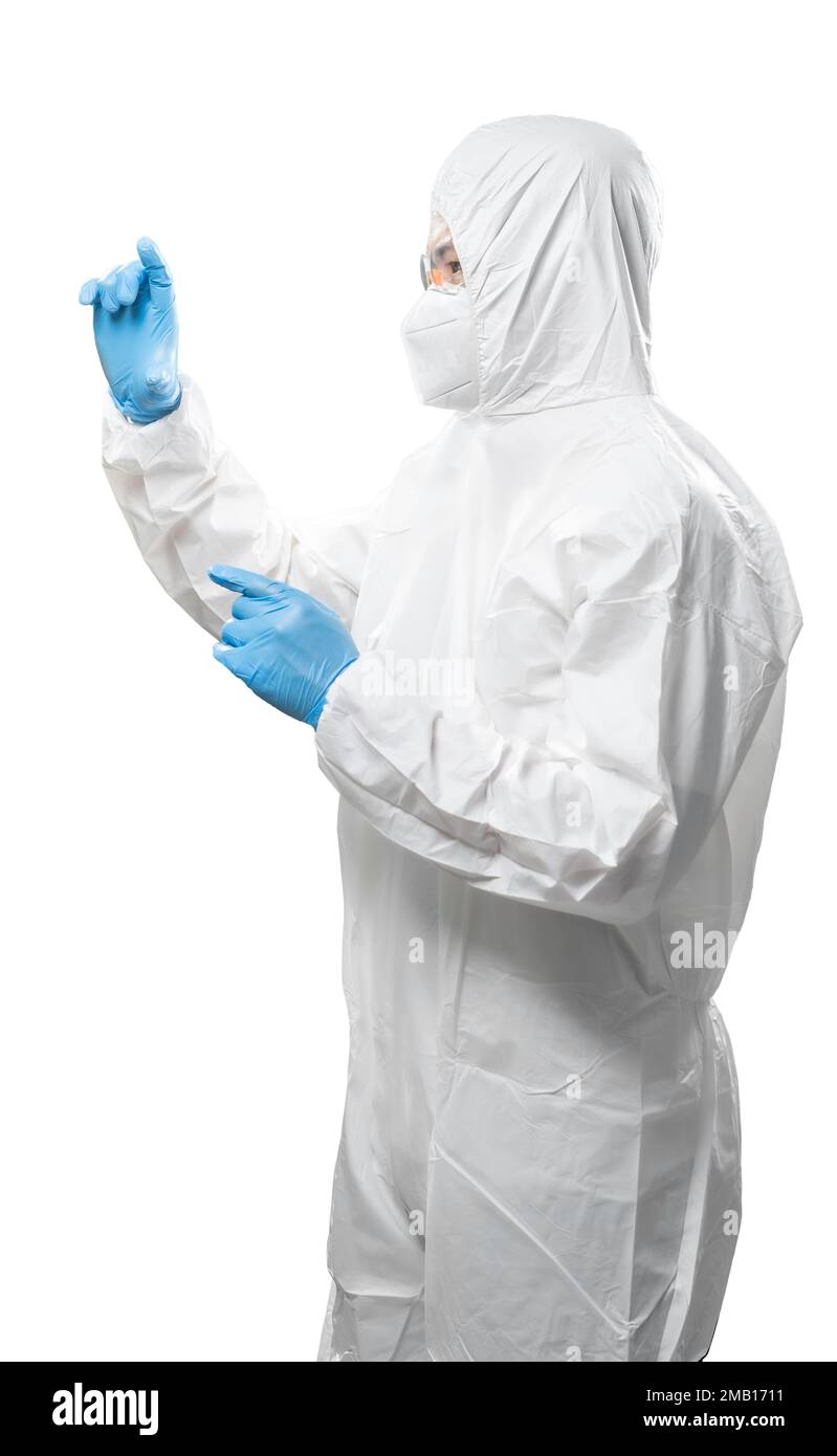 Worker wears medical protective suit or white coverall suit with mask ...