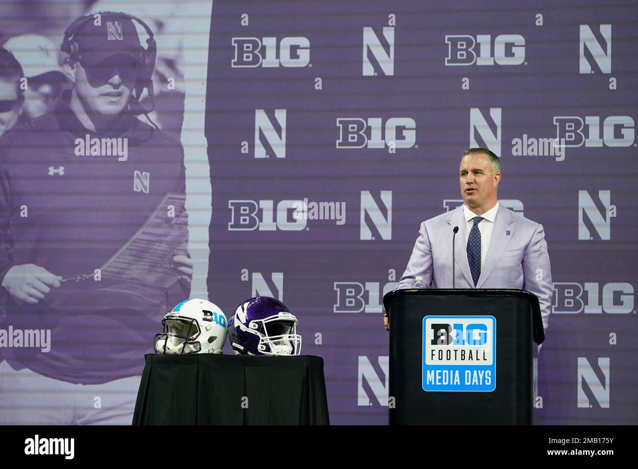 Northwestern head coach Pat Fitzgerald talks to reporters during an ...