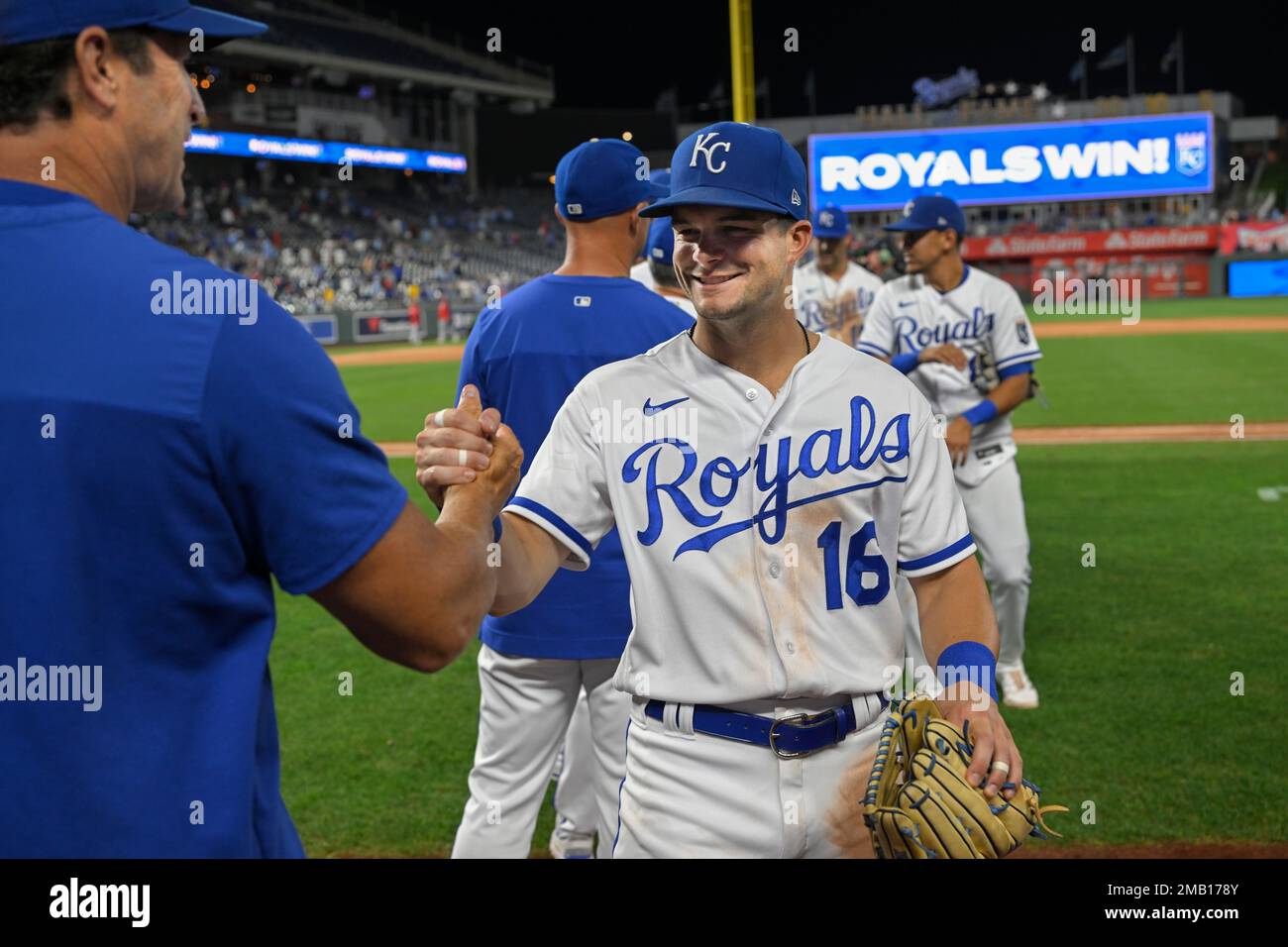 Kansas City Royals manager Mike Matheny, left, congratulates Andrew ...