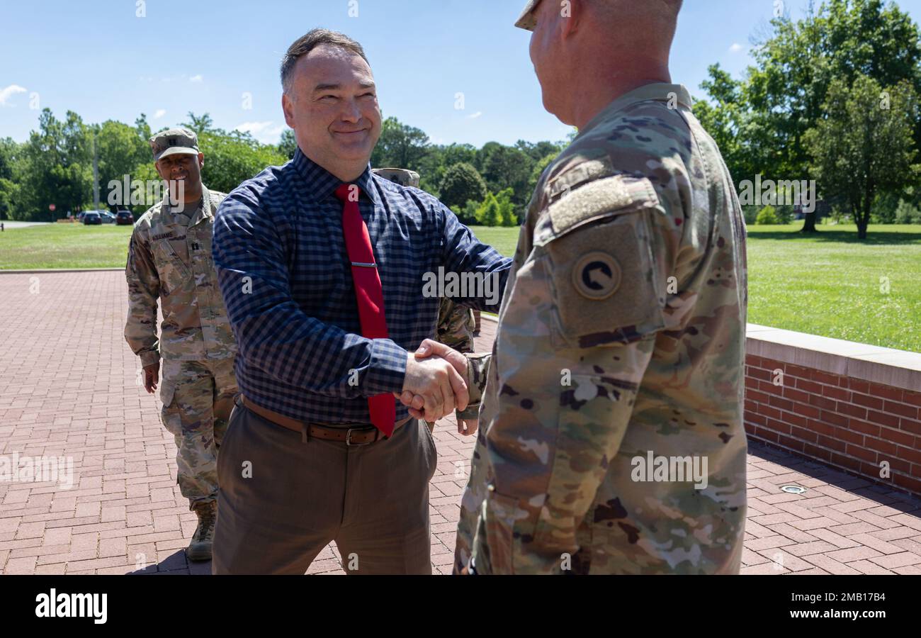 Dr. Steven Dewey (left), deputy support operations officer, 1st Theater ...