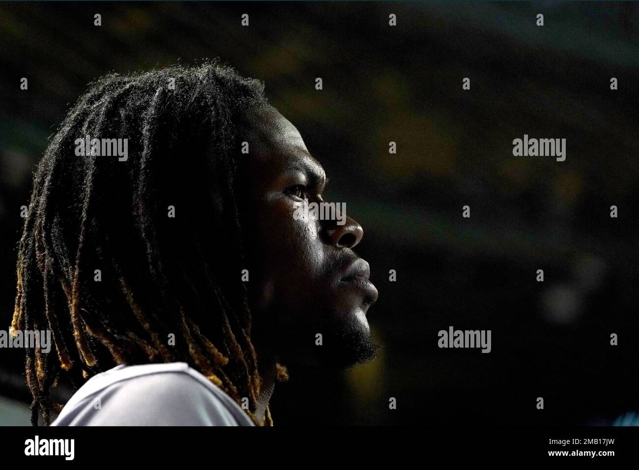 Pittsburgh Pirates' Oneil Cruz looks out from the dugout in a baseball ...