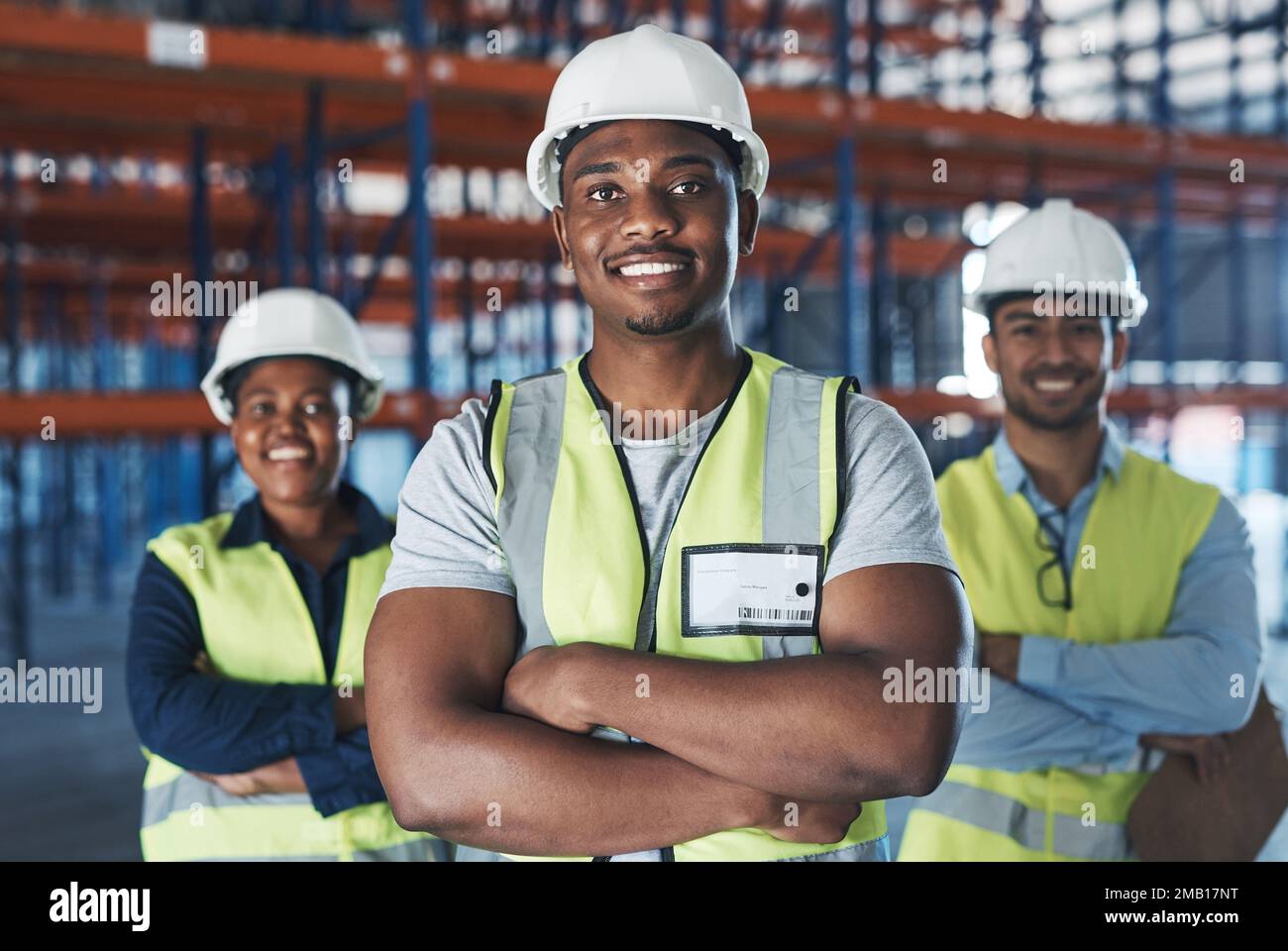 Portrait female warehouse standing arms hi-res stock photography and ...