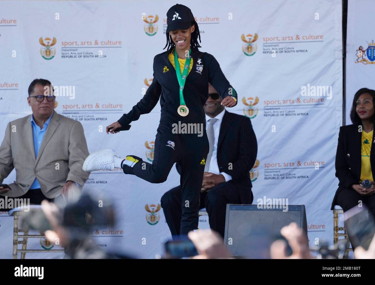 South Africa's Women's Soccer player Linda Motlhalo, front, dances as ...