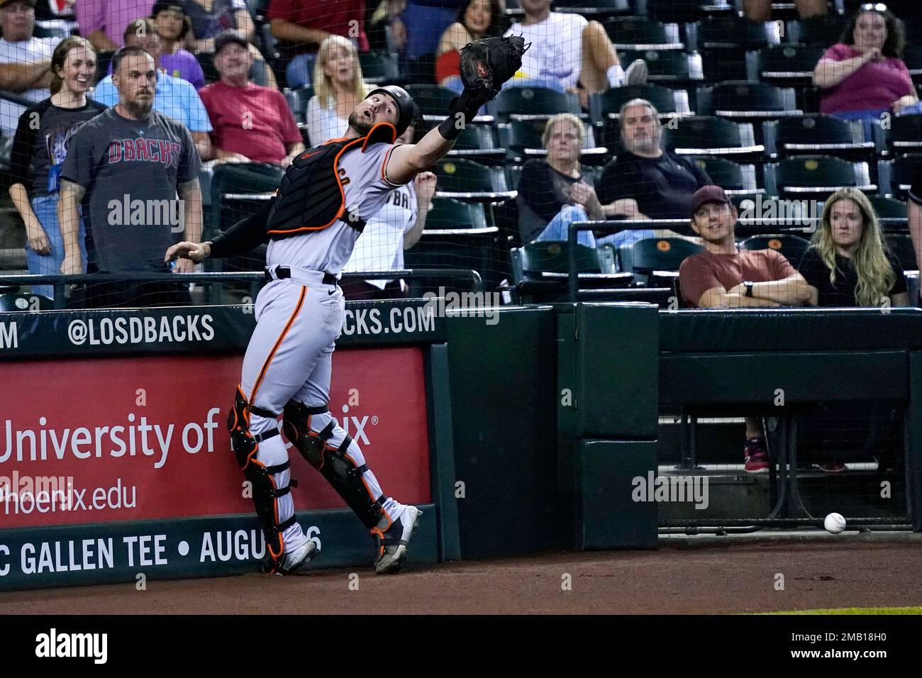 San Francisco Giants catcher Joey Bart is unable to make a catch on a ...