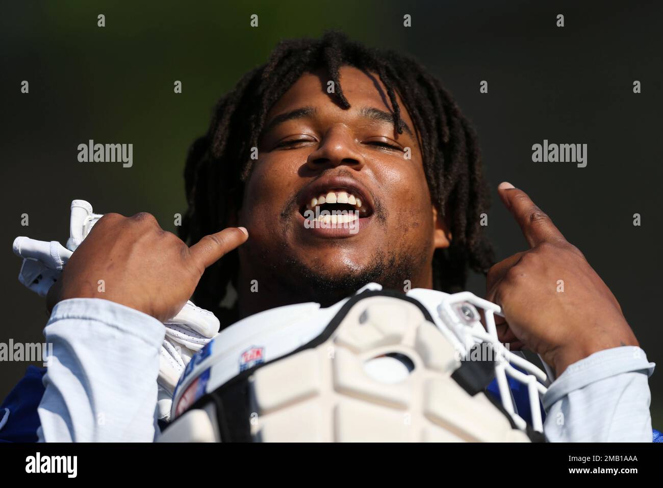 Buffalo Bills defensive tackle Tim Settle (99) calls out during ...