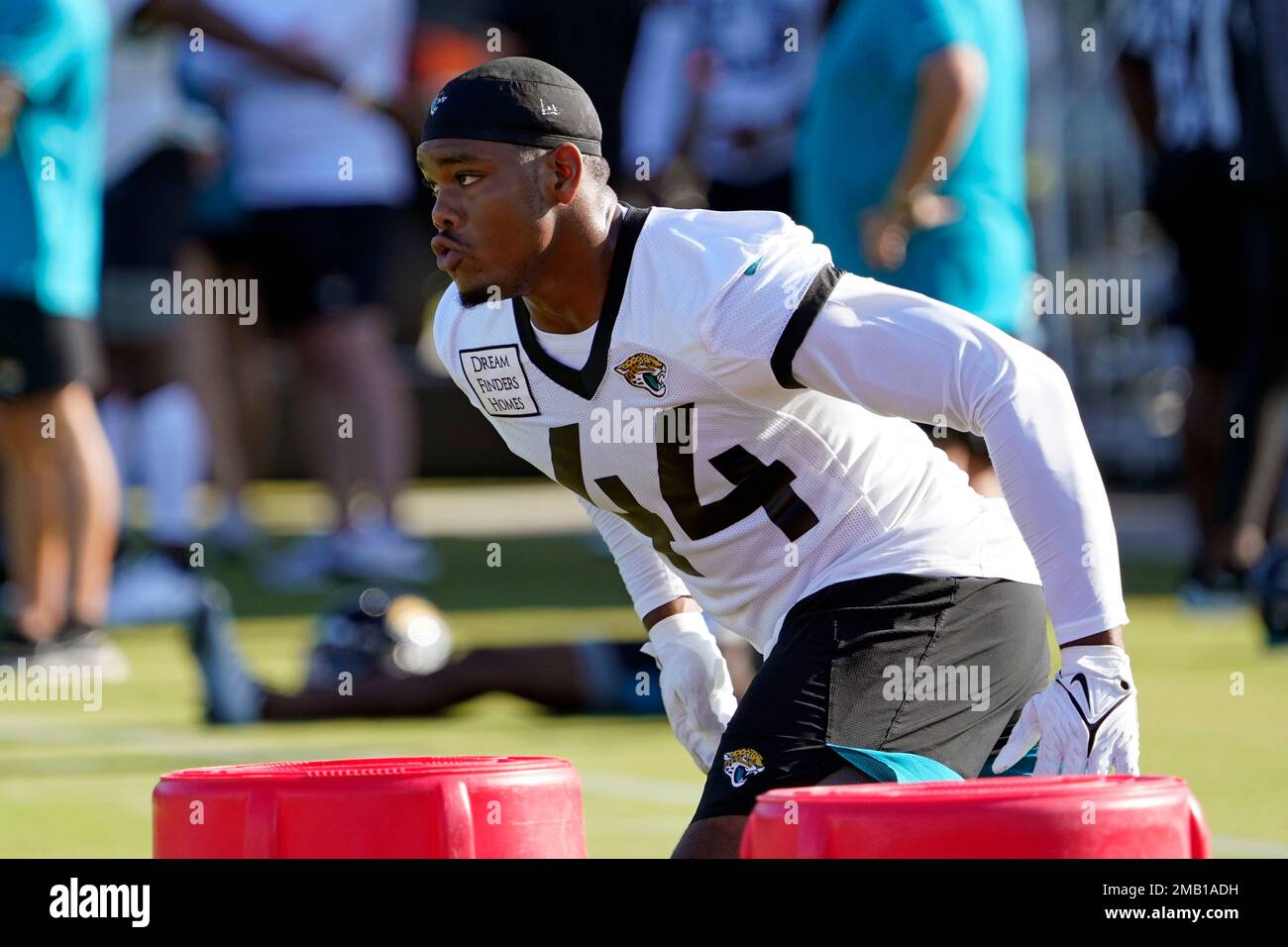 Jacksonville Jaguars outside linebacker Travon Walker (44) performs a ...