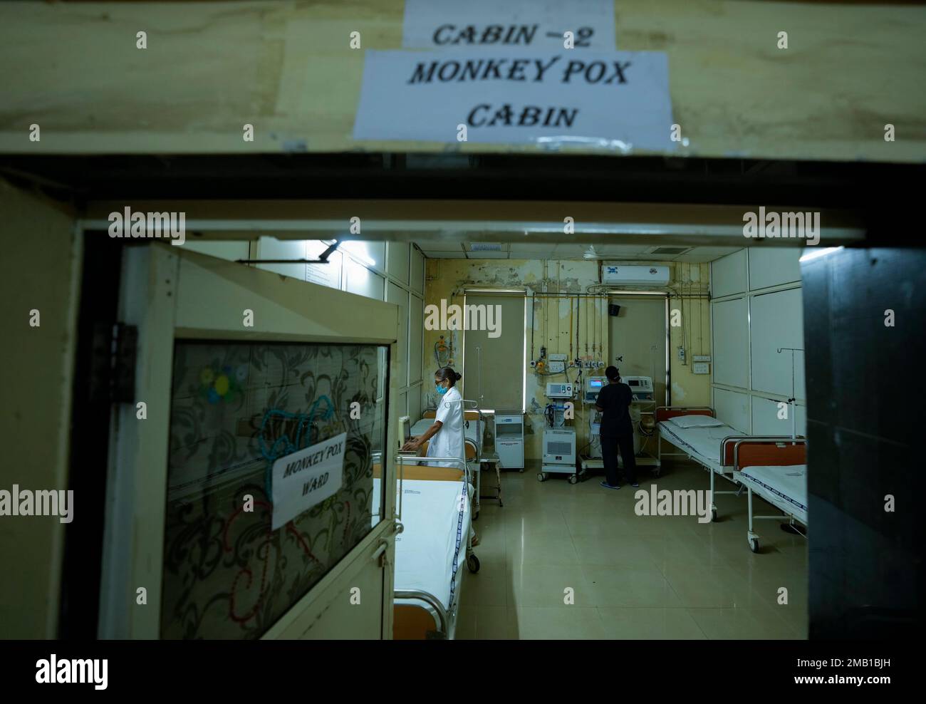 Health workers are seen at a monkeypox ward set up at a civil hospital ...