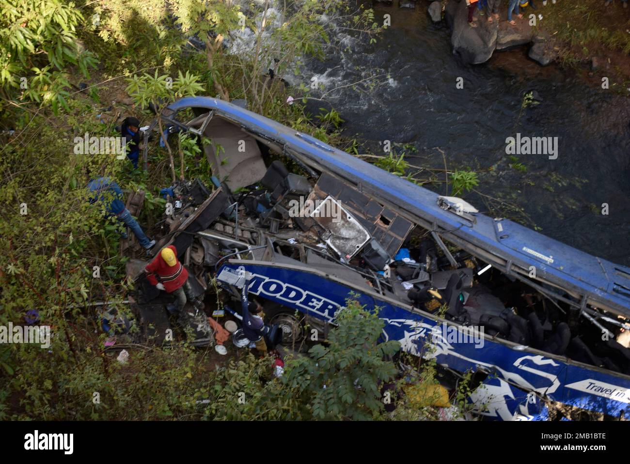 A view of the wreckage of a bus that plunged into Nithi bridge on ...