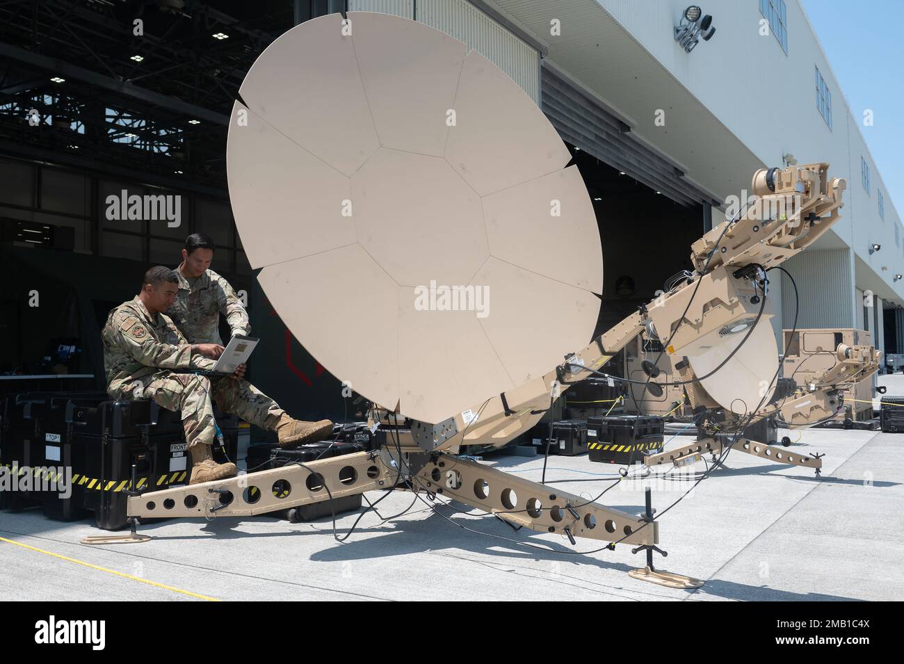 U.S. Airmen assigned to the 644th Combat Communications Squadron and ...