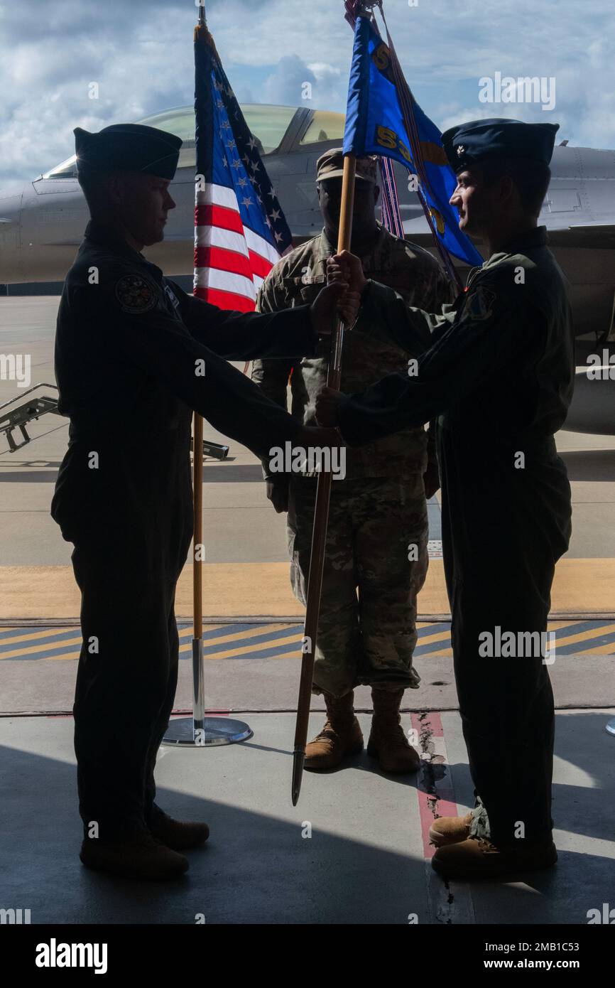 U.S. Air Force Lt. Col. Erik Flippin, right, assumes command of the ...