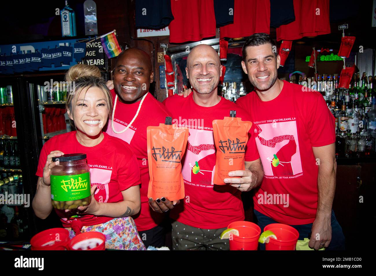 Daniel Singer, CEO & Founder of Filthy Food, center, is seen at Tales ...