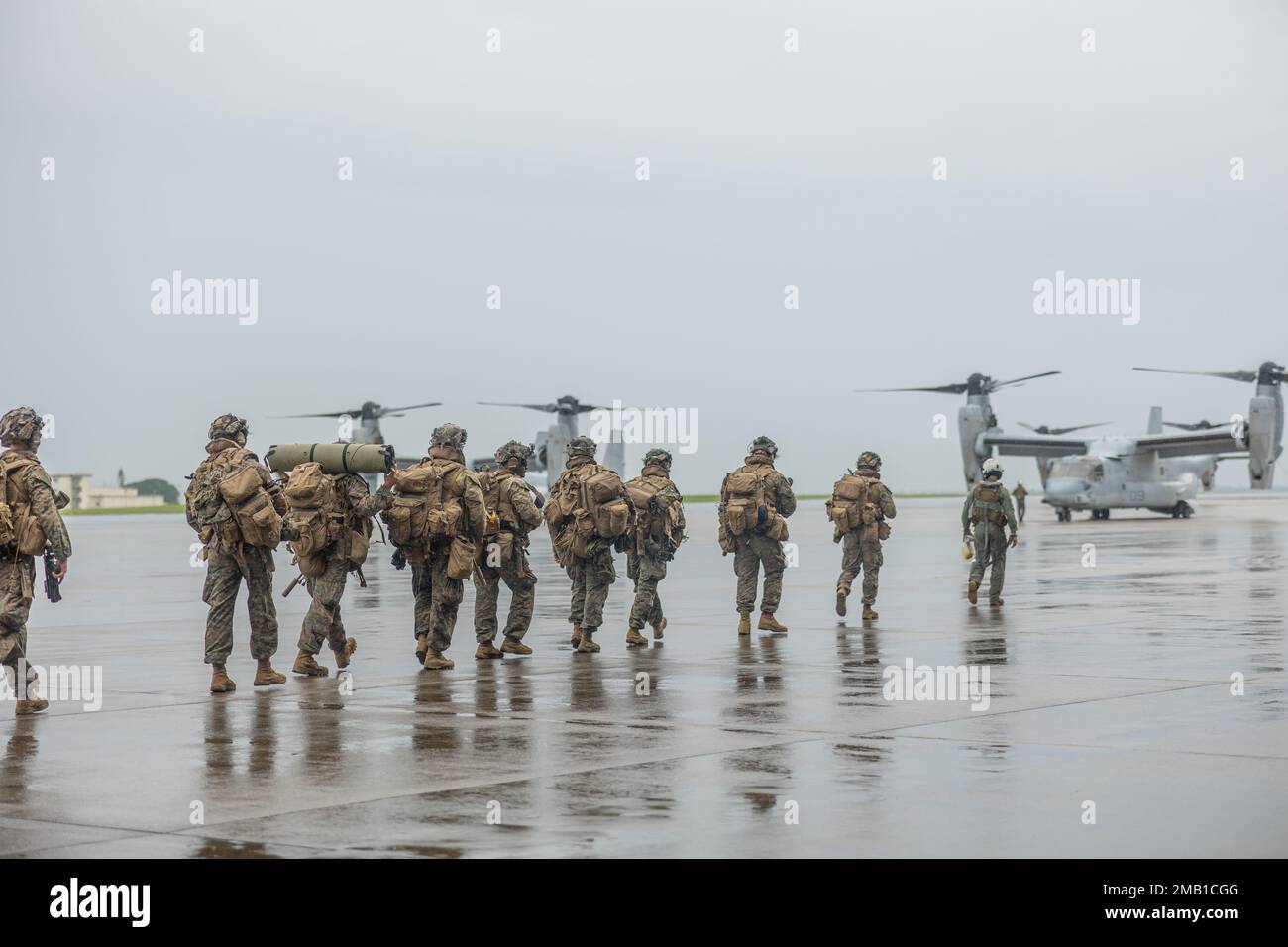 U.S. Marines with 3d Battalion, 2d Marines, prepare to board an MV-22B ...