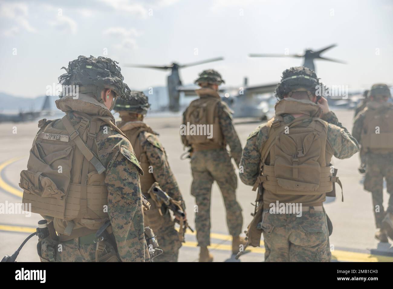U.S. Marines with 3d Battalion, 2d Marines, prepare to board an MV-22B ...