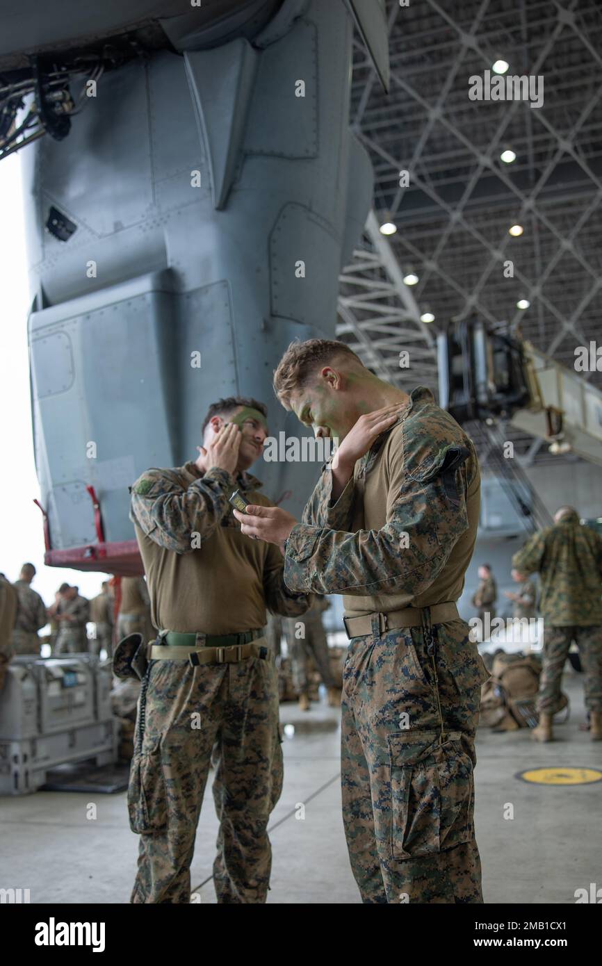 U.S. Marines with 3d Battalion, 2d Marines, prepare to board an MV-22B ...