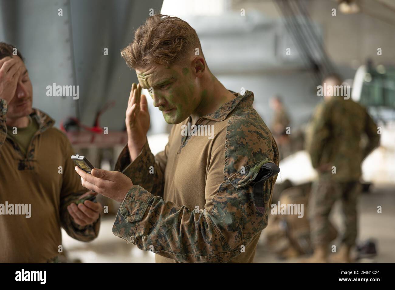 U.S. Marines with 3d Battalion, 2d Marines, prepare to board an MV-22B ...