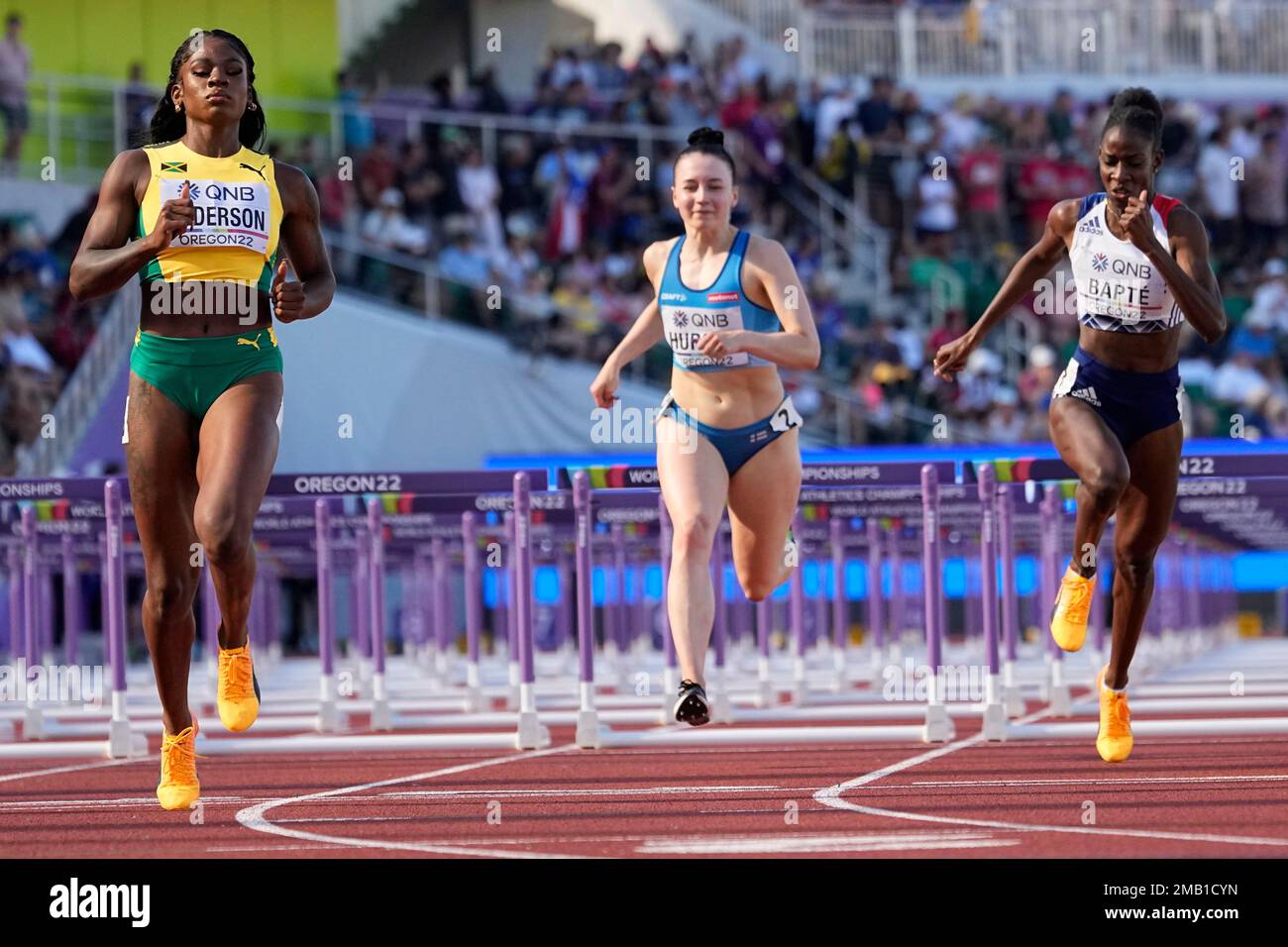 Britany Anderson, of Jamaica, left, wins the women's 100-meter hurdles ... Britany Anderson, of Jamaica, left, wins the women's 100-meter hurdles ...