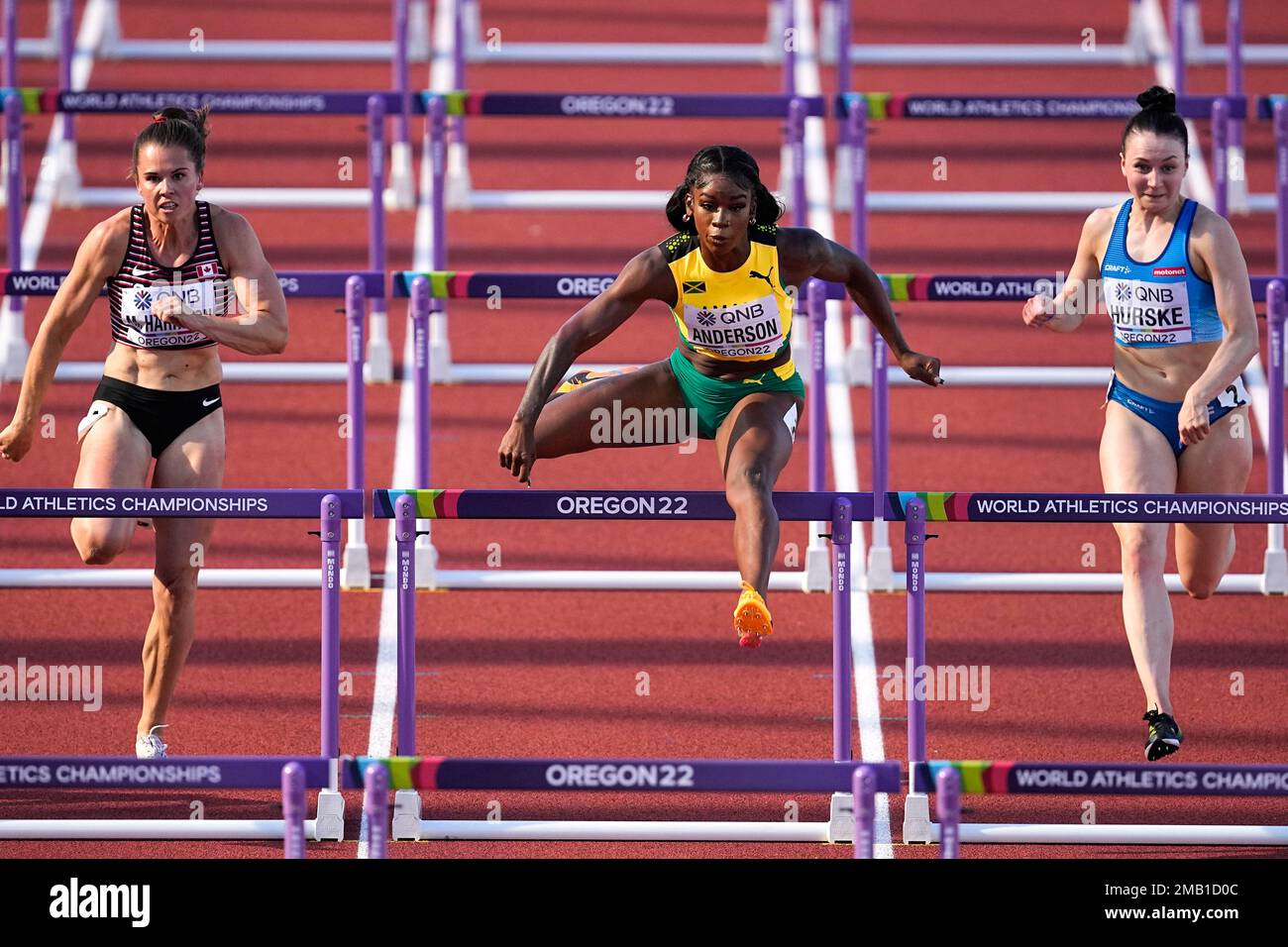 Britany Anderson, of Jamaica, center, wins the women's 100-meter ... Britany Anderson, of Jamaica, center, wins the women's 100-meter ...