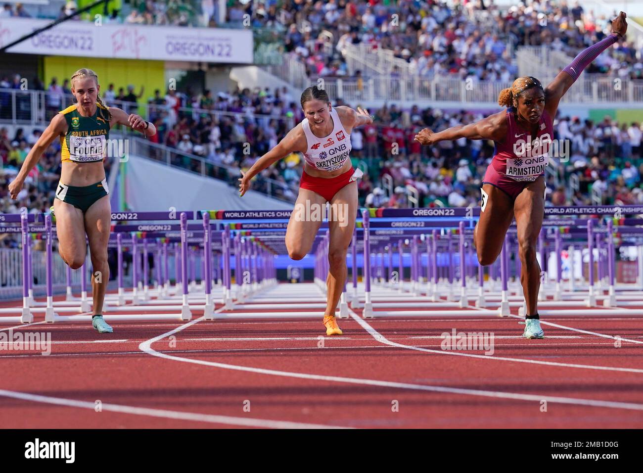Alia Armstrong, of the United States, right, wins the women's 100-meter ...