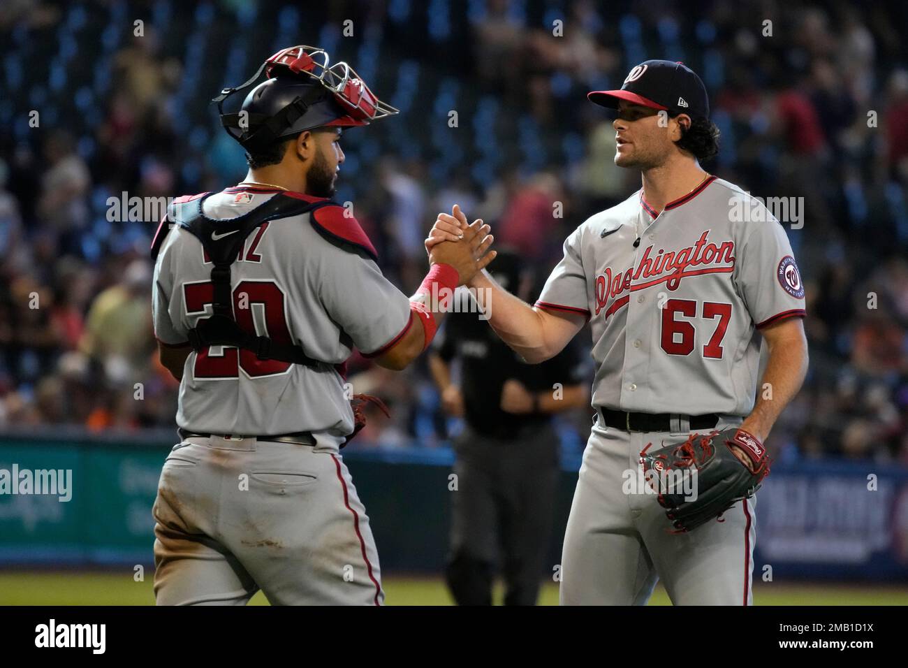 Washington Nationals pitcher Kyle Finnegan (67) celebrates with catcher ...