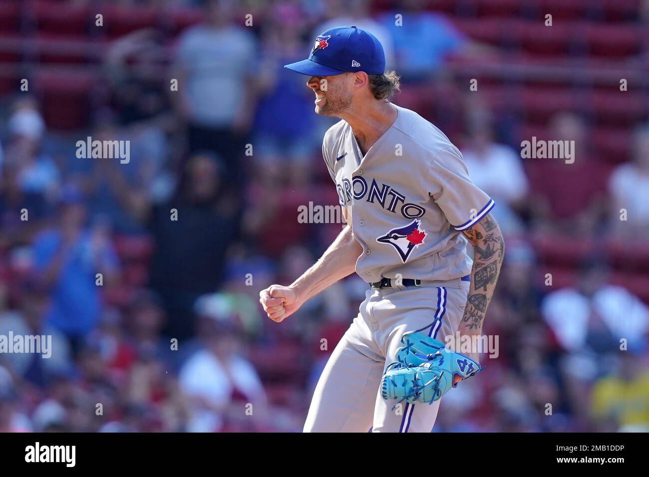 Toronto Blue Jays' Adam Cimber pumps his fist after striking out Boston ...
