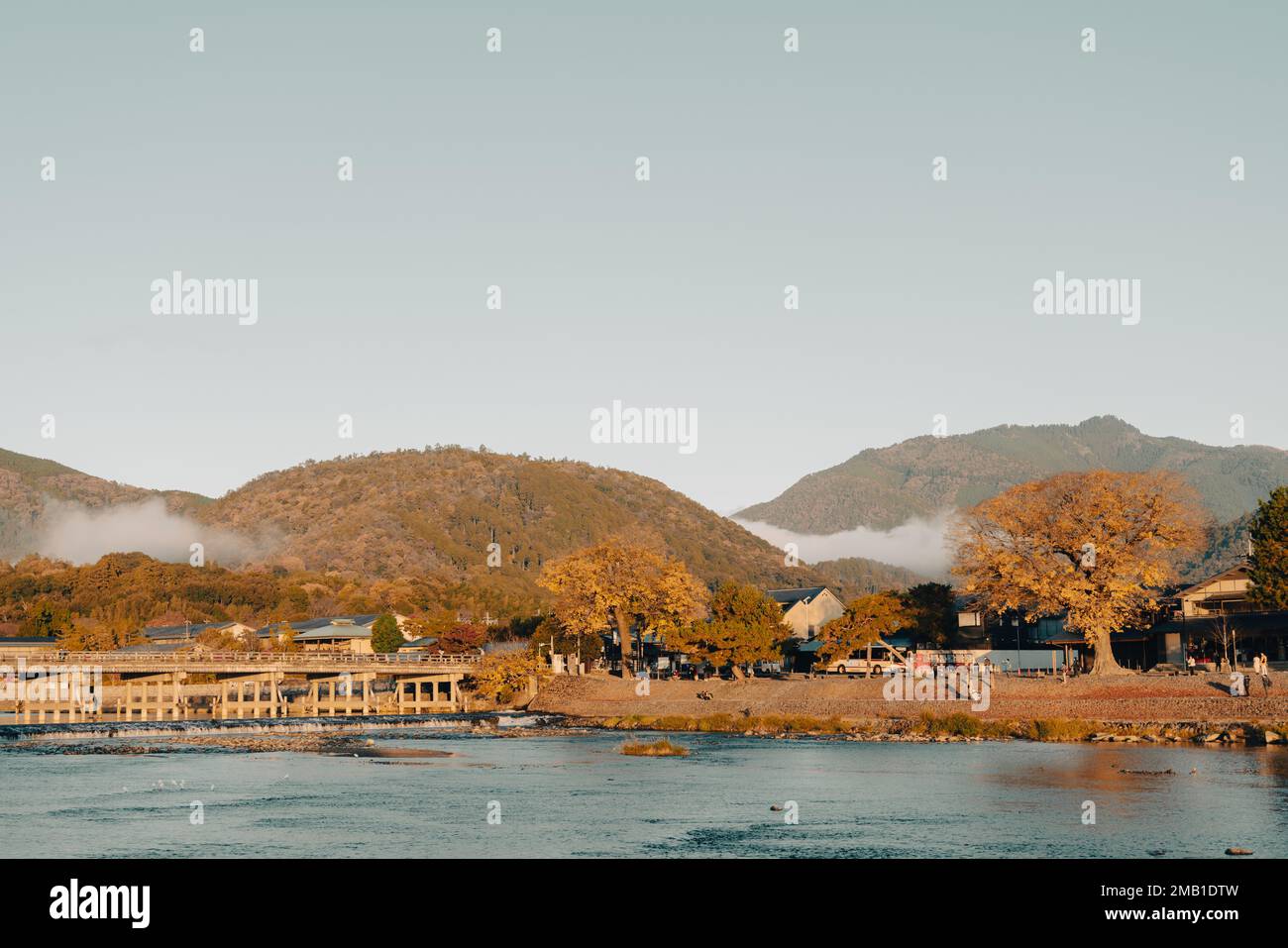 Arashiyama river and bridge, autumn rural scenery in Kyoto, Japan Stock ...