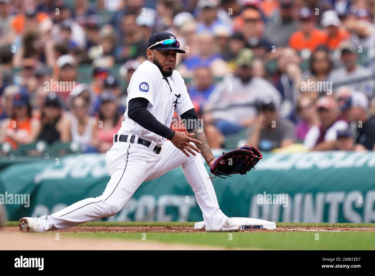 Detroit Tigers first baseman Harold Castro misplays the ball hit by ...