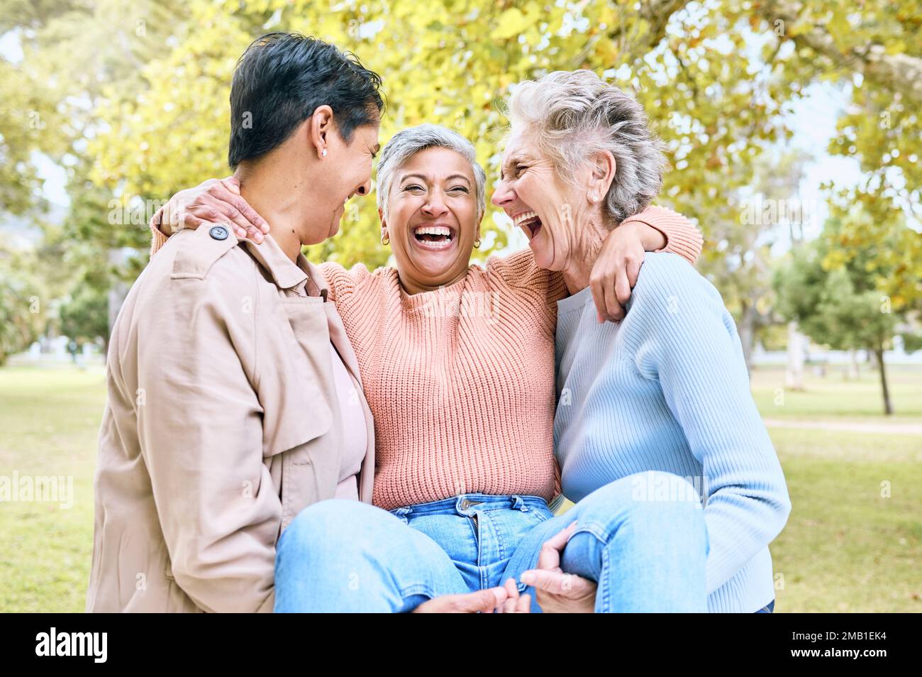 Senior women, laughing or carrying in funny games, comic activity or ...