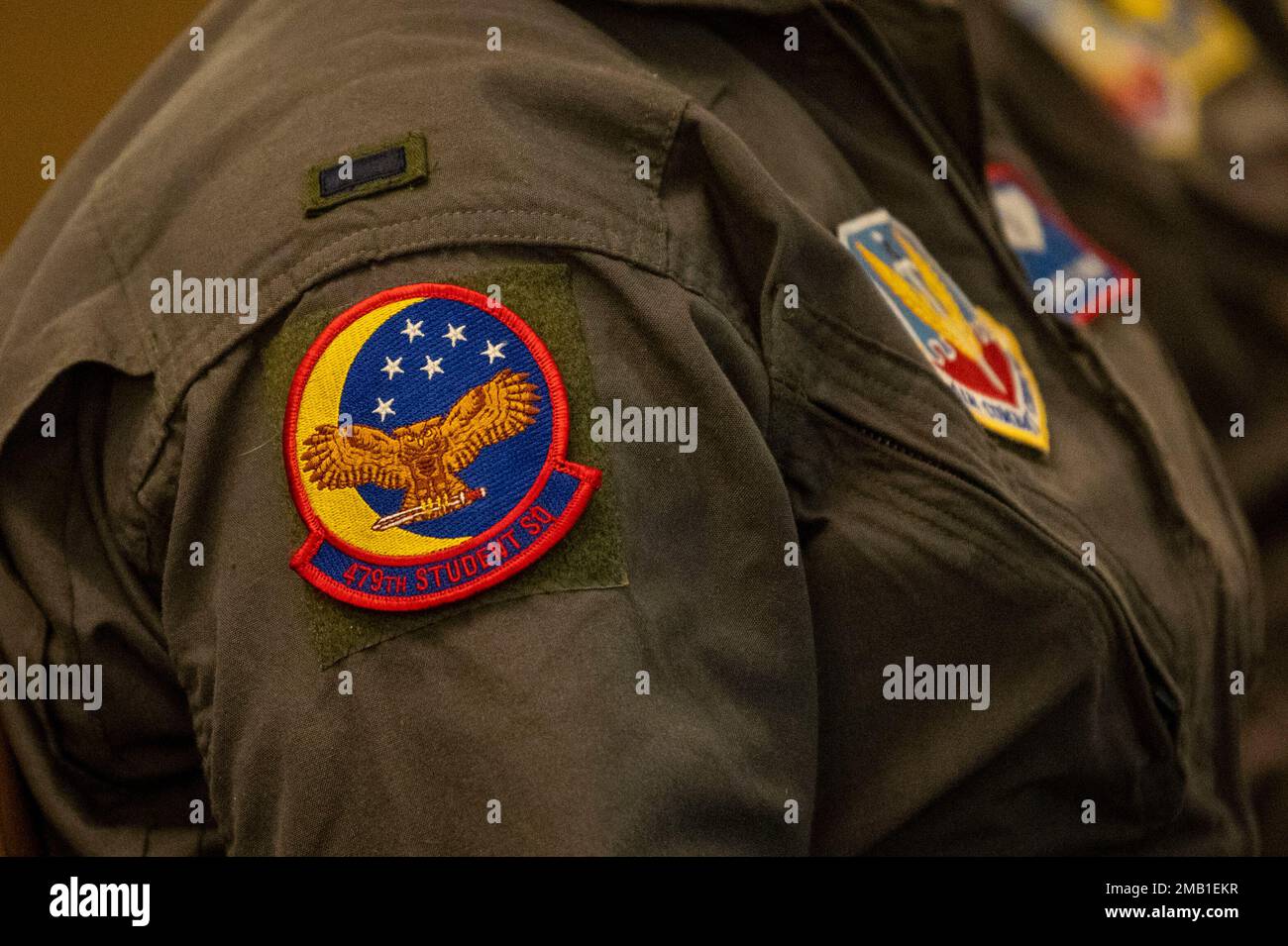 A First Term Officer Course student wears a 479th Student Squadron ...