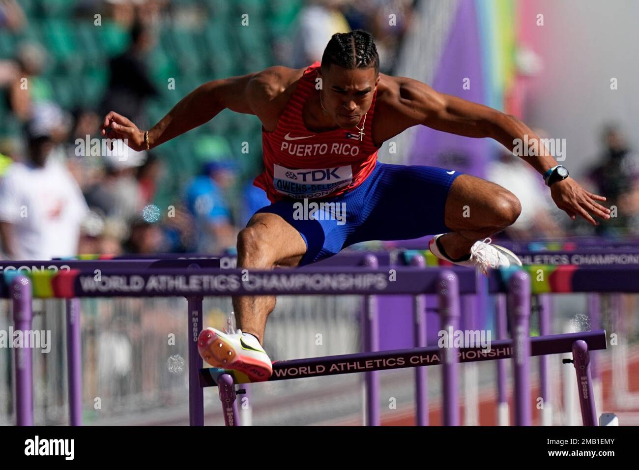 Ayden Owens-Delerme, of Puerto Rico, competes during a heat in the ...