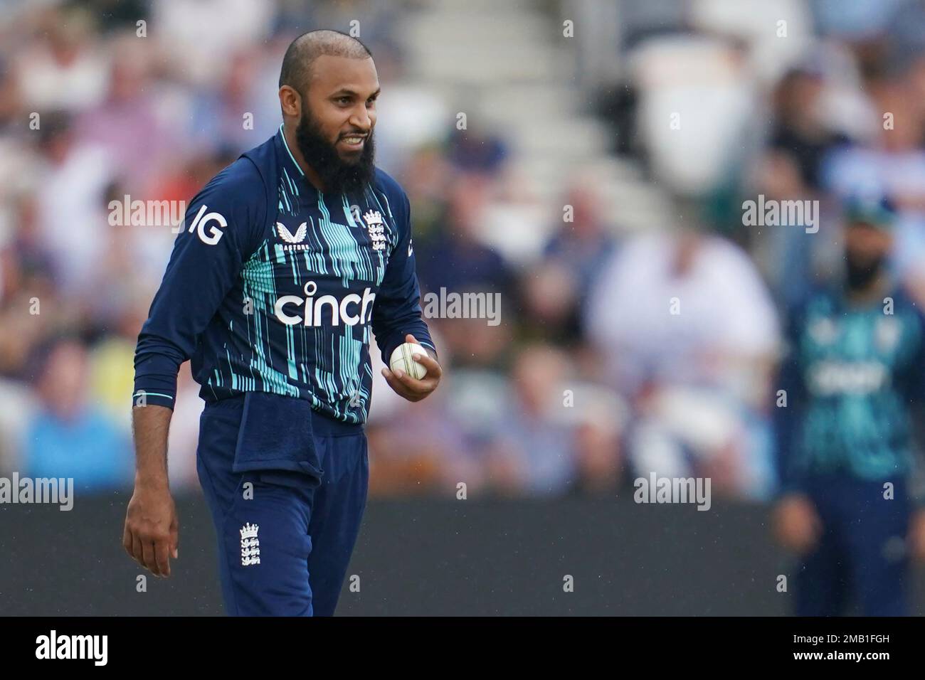 England's Adi Rashid smiles during the third one-day international ...